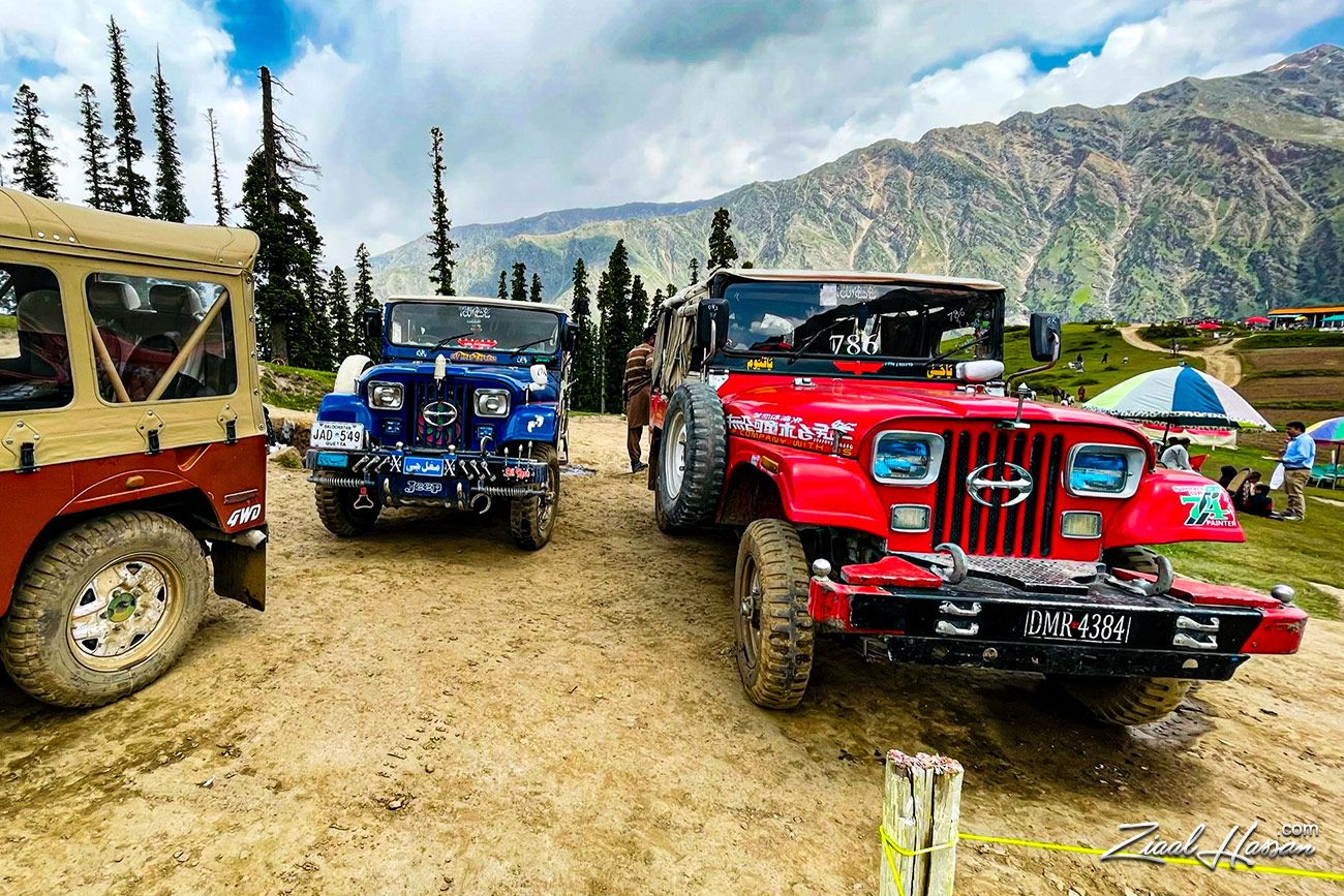 Colorful 4x4 Jeeps in a Majestic Mountain Valley - NPSP.Pk - National ...
