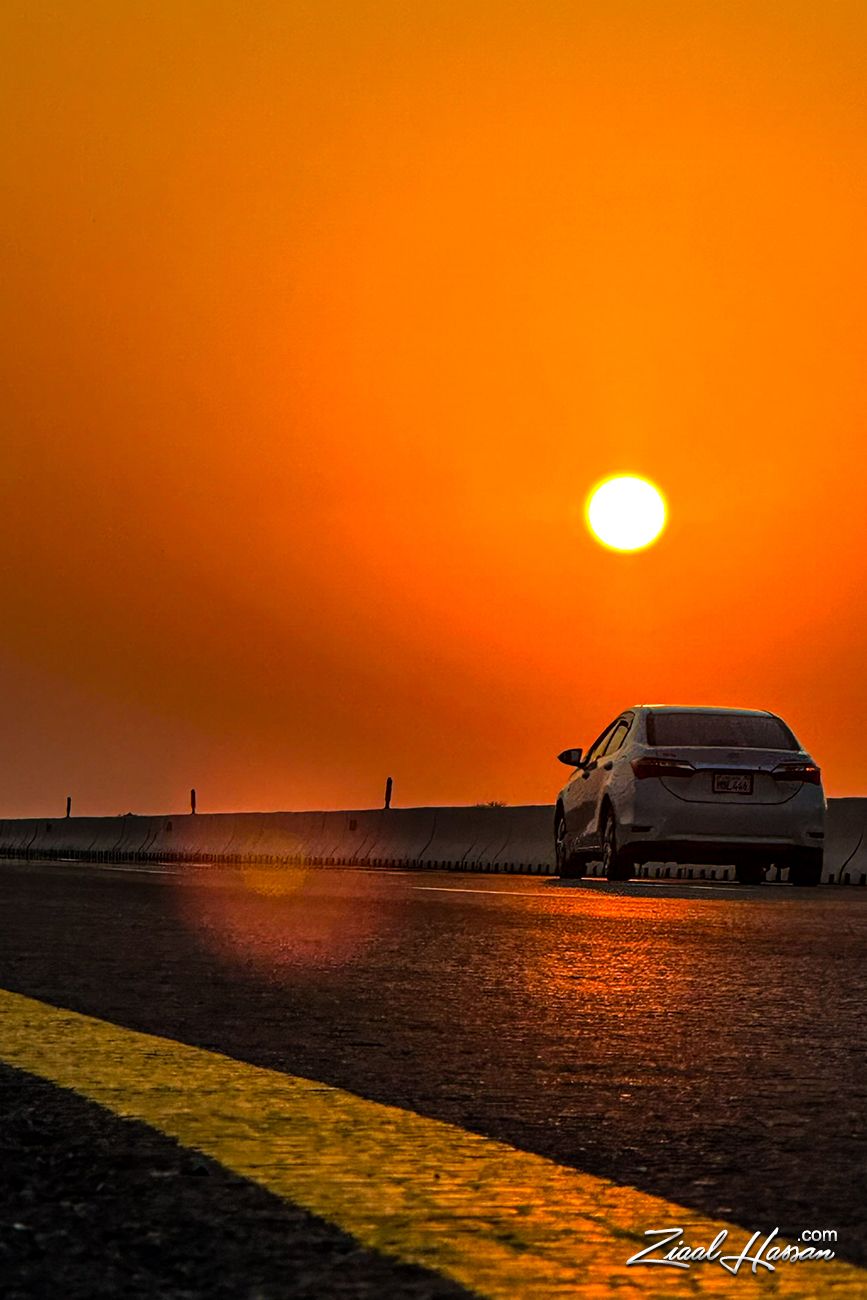 Golden Hour Sunset Over Highway with Driving Car - NPSP.Pk - National ...